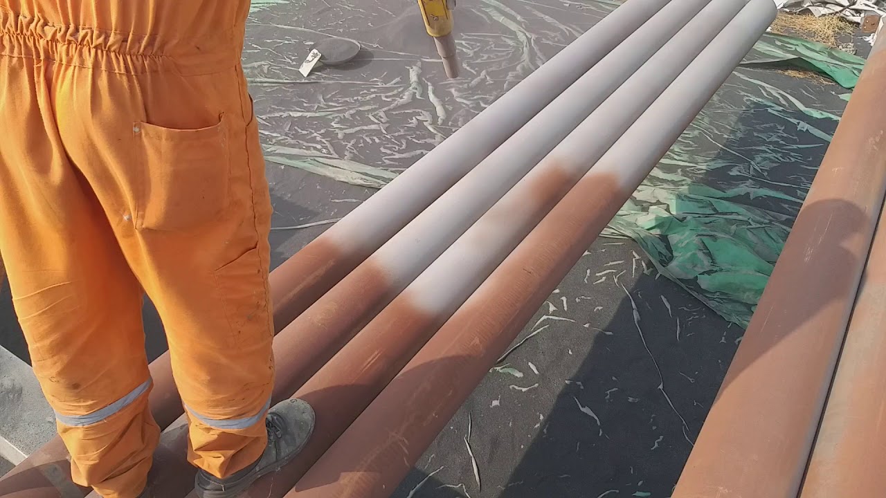 Copper slag blasting in pipe - YouTube