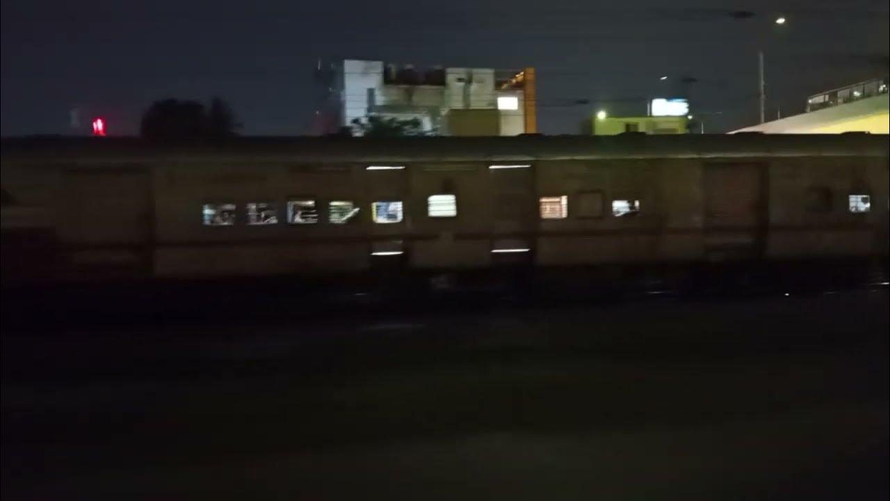 Train 12601 skips perambur Carriage works parallel with Chennai local suburban train - YouTube