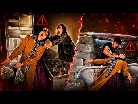 The second wife threatens the first wife to take away the food.