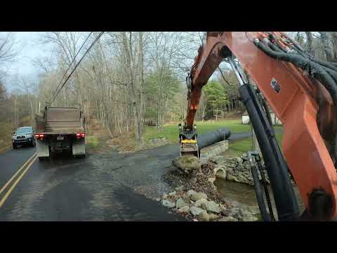 Giant driveway culvert pipe install - YouTube