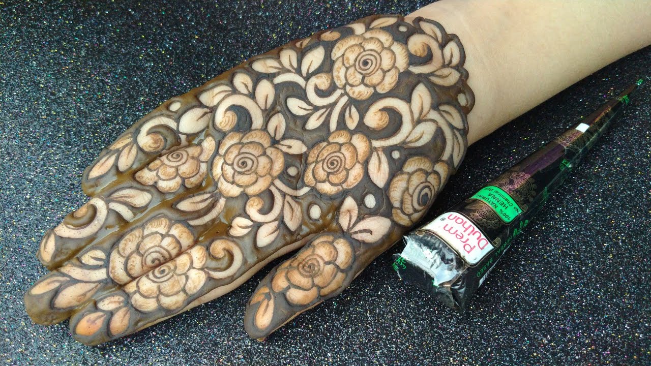 Bold beautiful floral mehndi design| Front hand henna | Negative space ...