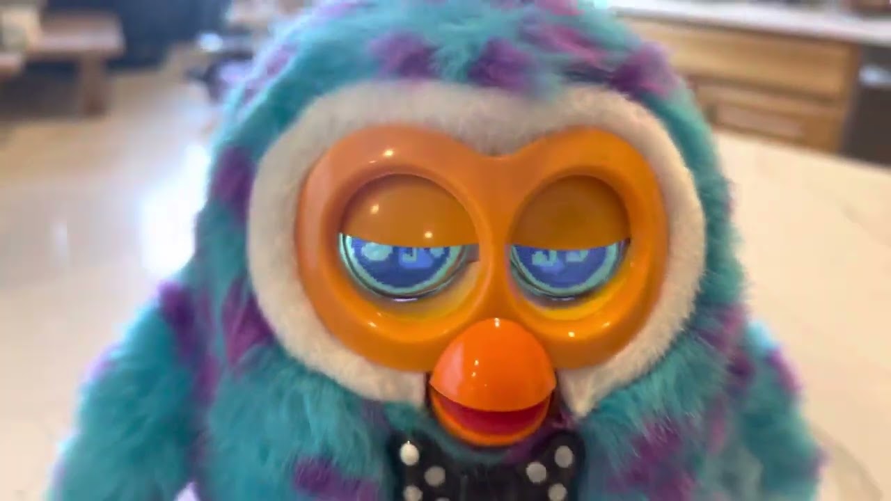 Using the Fuzzy Wonderz app to use my Blue with purple spots owl smart ...