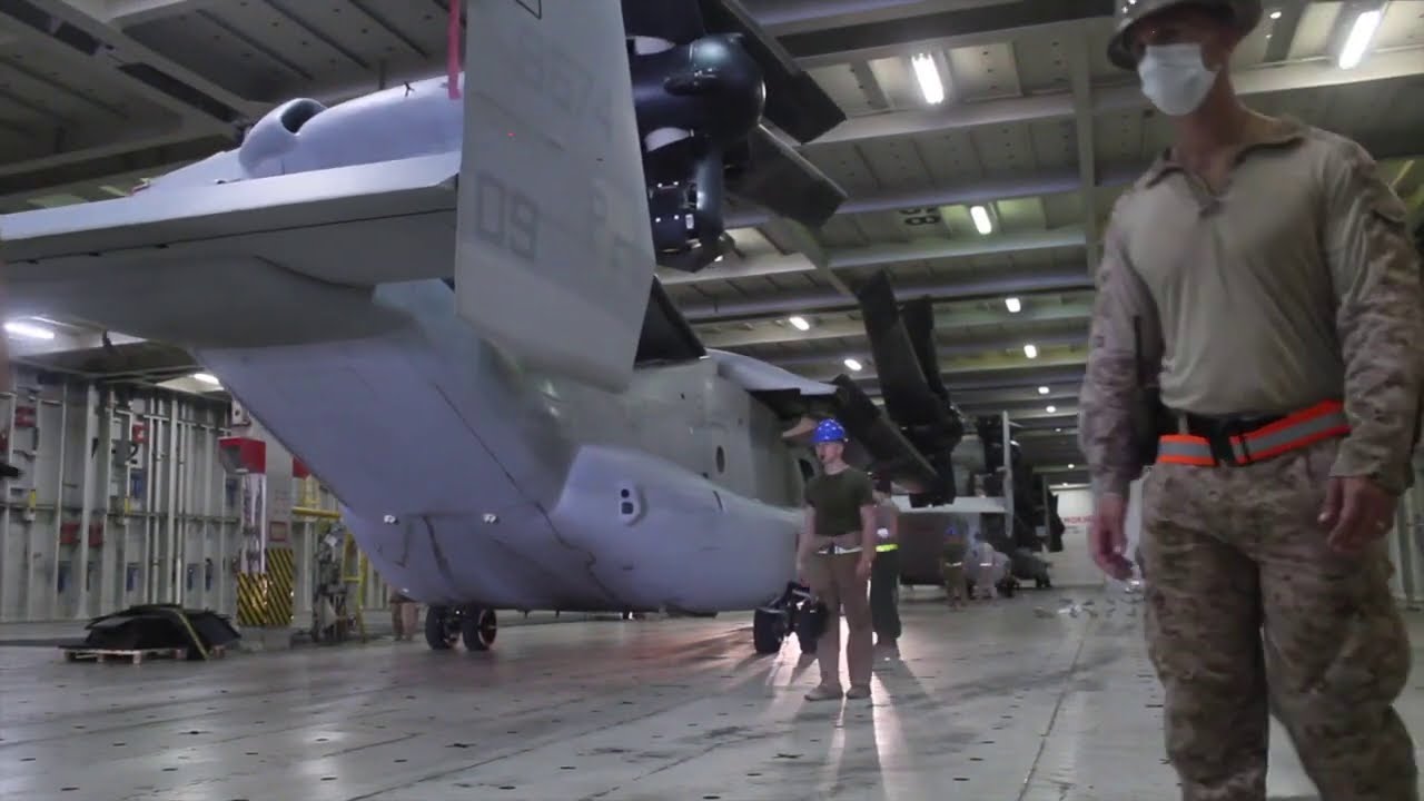 Marine Corps MV 22B Ospreys Unload From USNS Green Ridge Vehicles ...