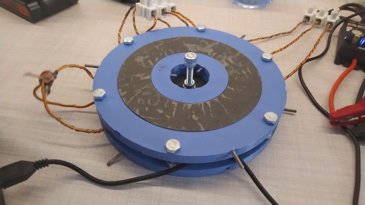 Home made axial flux motor first spins - YouTube