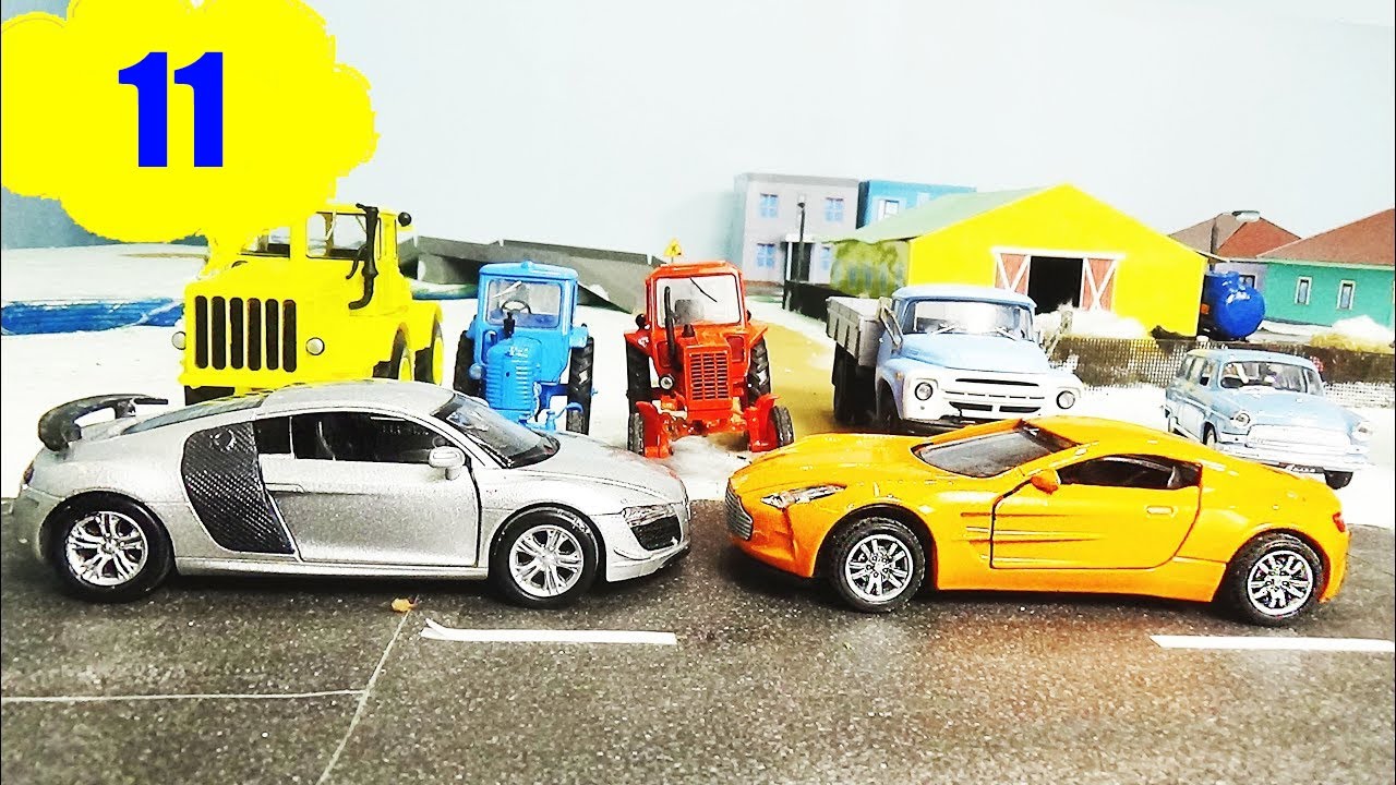 Tractors and cars watch a race - YouTube