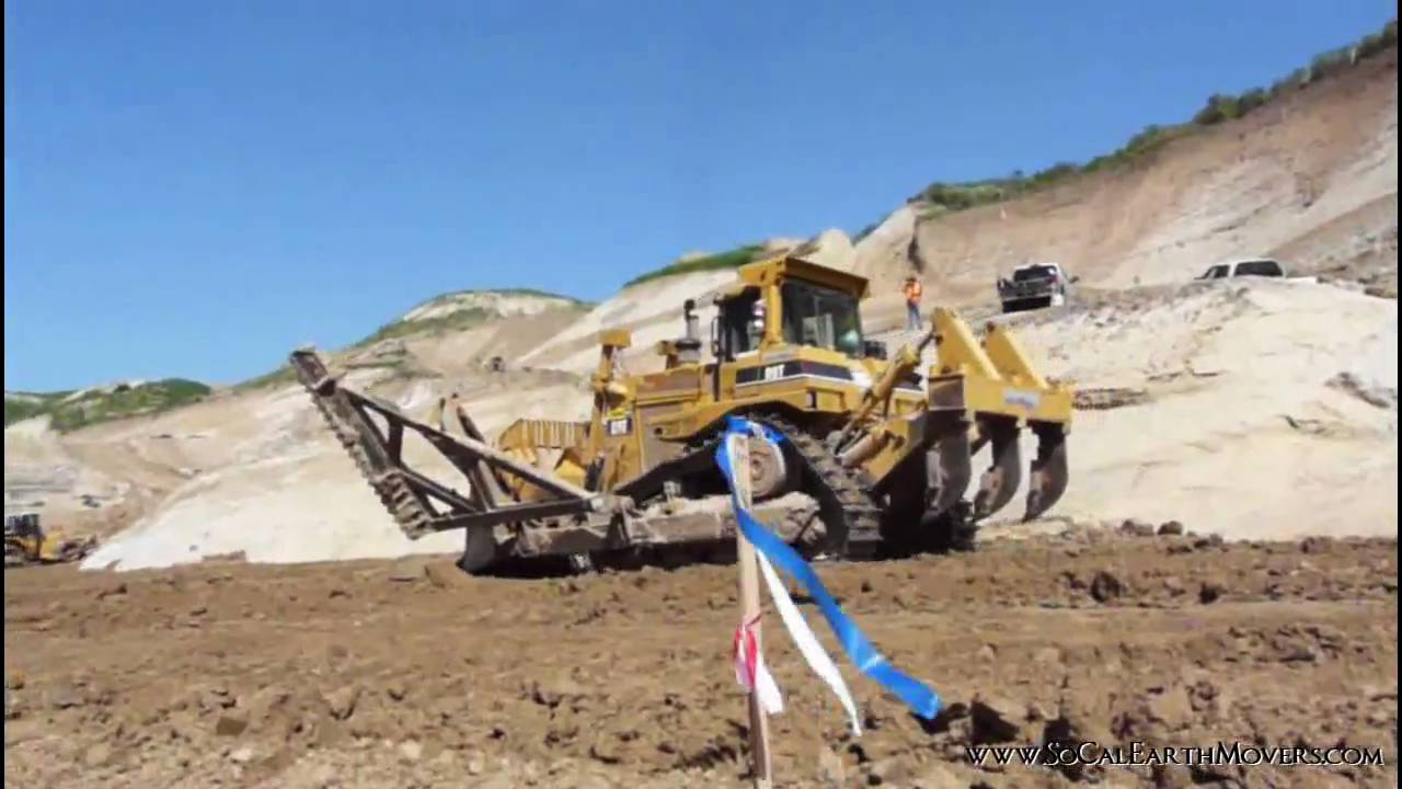 CAT 657E's,D9T,& 825C in the fill - YouTube
