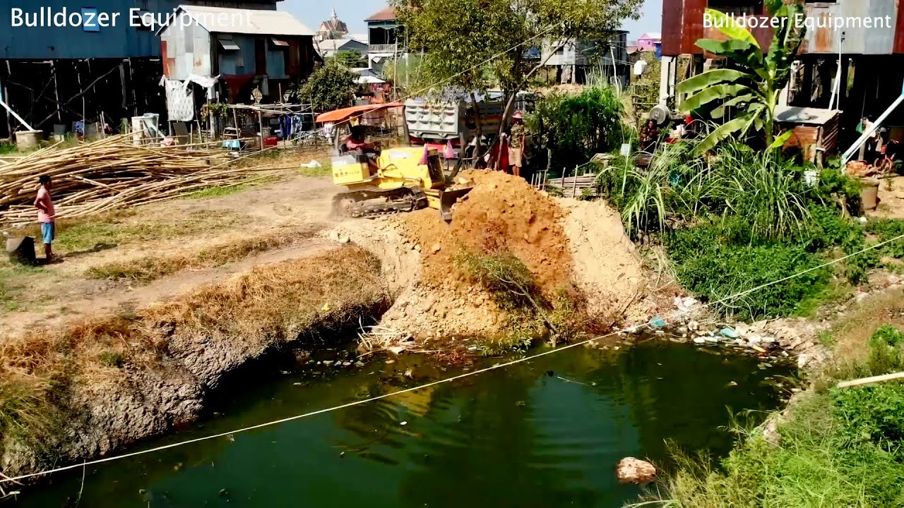 Video of a 5-Ton Truck carrying soil to remove water filled with ...