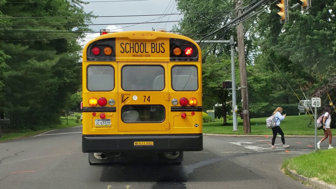 Are school buses allowed to do a stop in an intersection? - YouTube