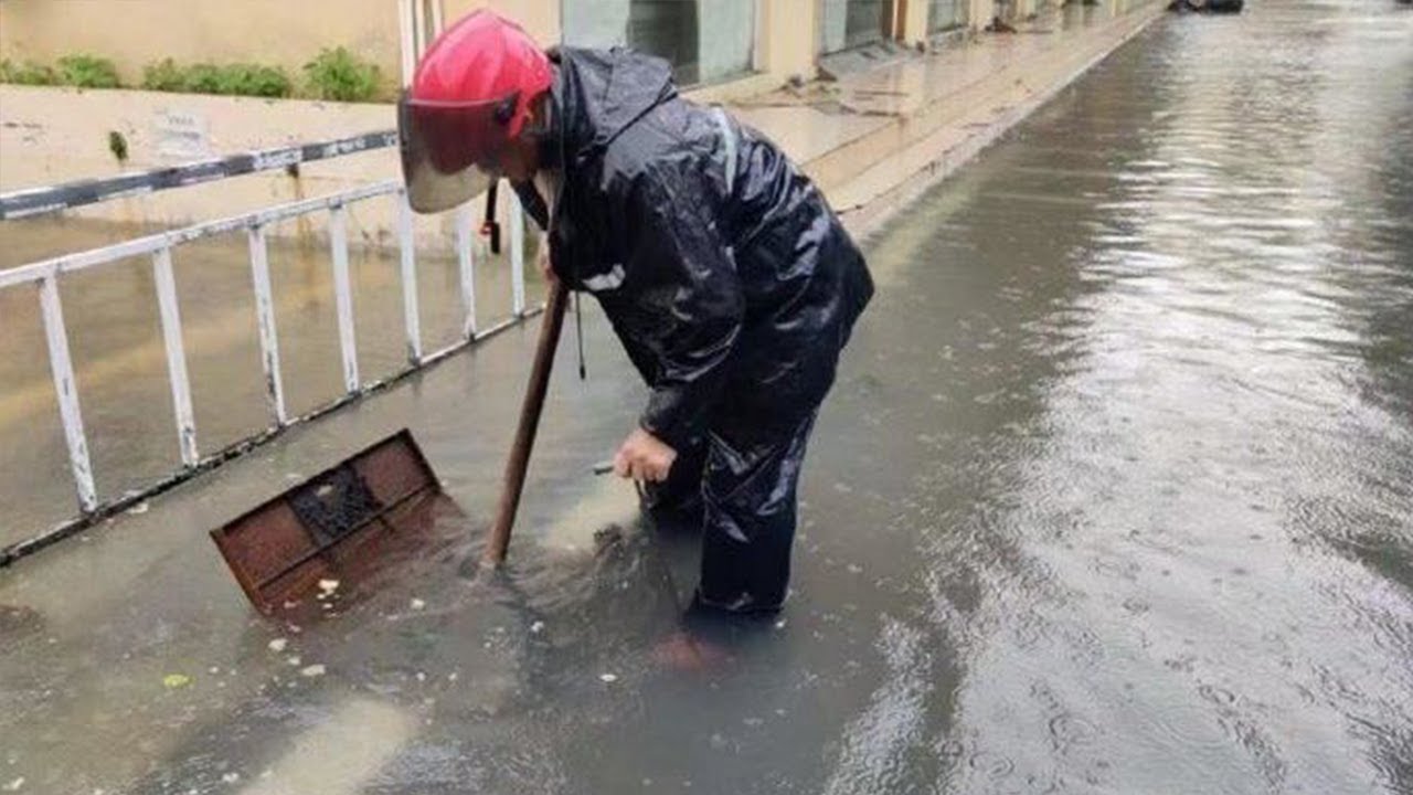 Drenched to Dazzling Cleaning Debris Blocked Drains to Save Flooded ...
