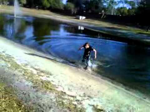 Pearce jumping into pond in winter - YouTube