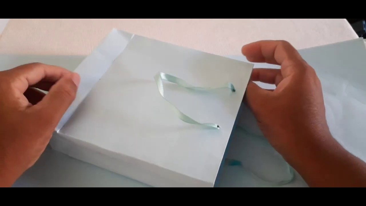 Simples e fácil como fazer bolsinha com cartolina - YouTube