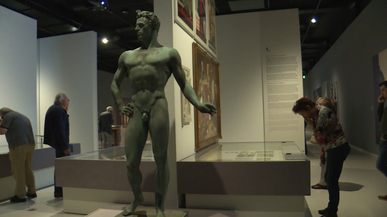 Curious visitors flock to Nazi design expo at Dutch Museum | AFP - YouTube