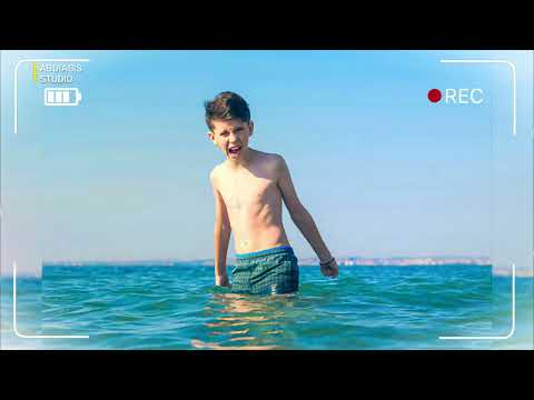 13 years old boy swimming and relaxation in the sea waves