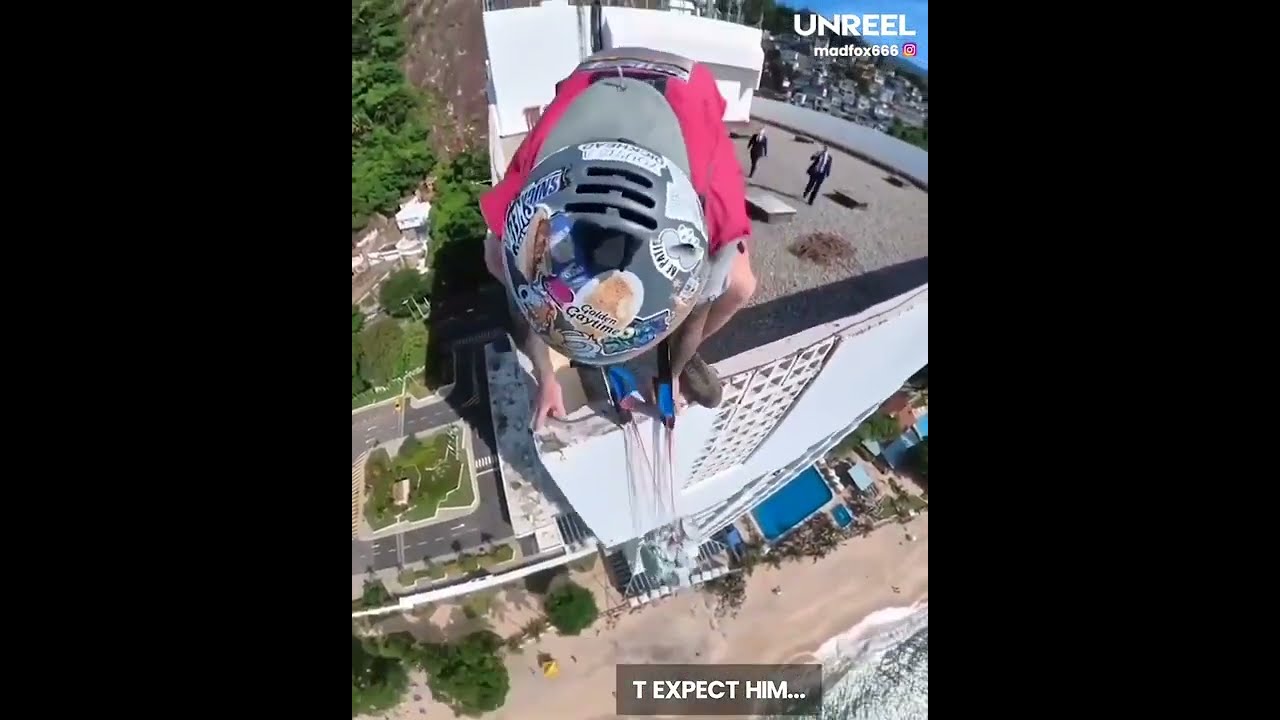 Guy Escapes Security By Jumping Off Hotel Roof 😱 - YouTube