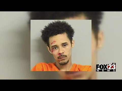 Video: Robbery suspect escapes police car, attempts to run, but tumbles ...