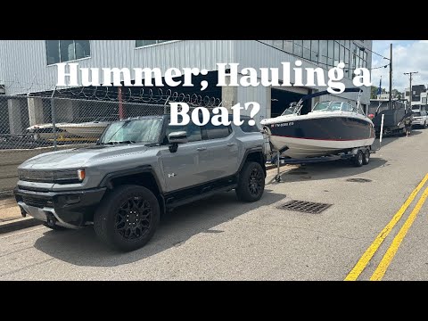 Hummer EV2X Hauling a Boat out of the Lake - YouTube
