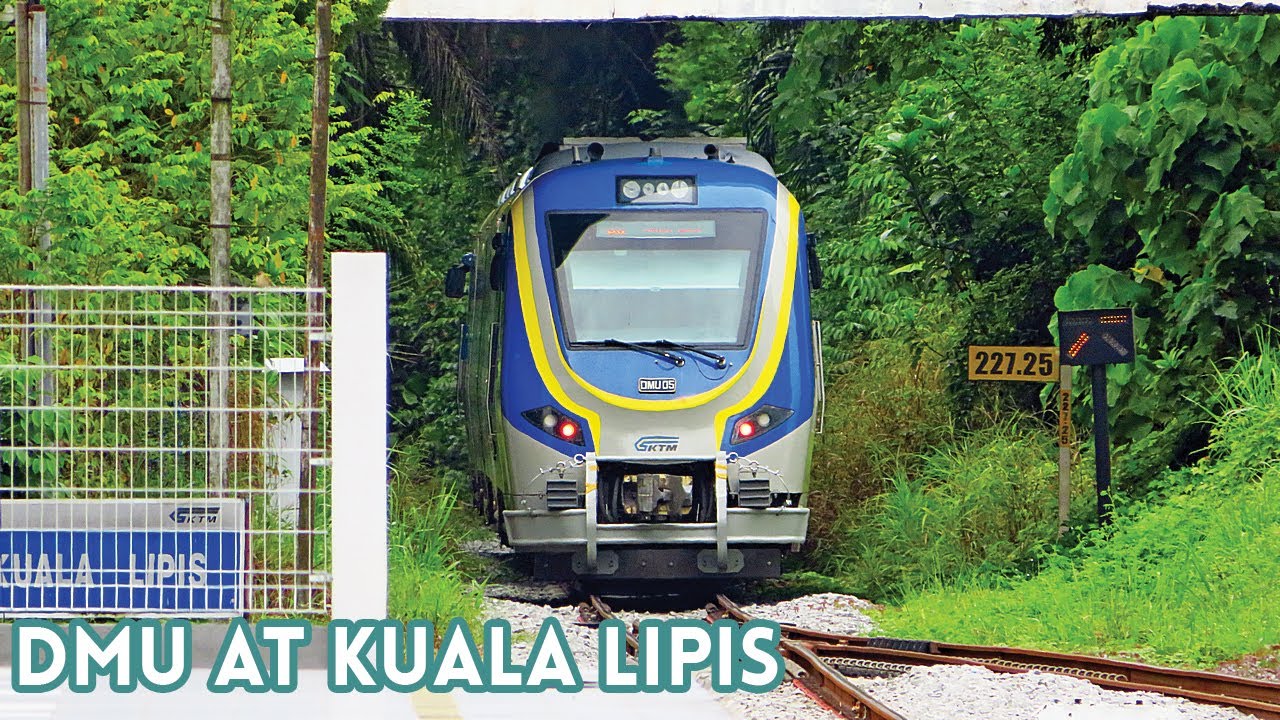 KTMB's DMU reversing into the mainline at Kuala Lipis - YouTube