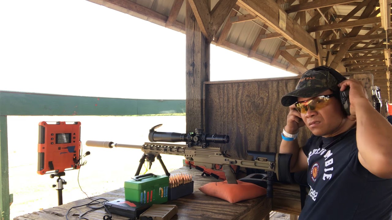 338 Lapua with suppressor - YouTube