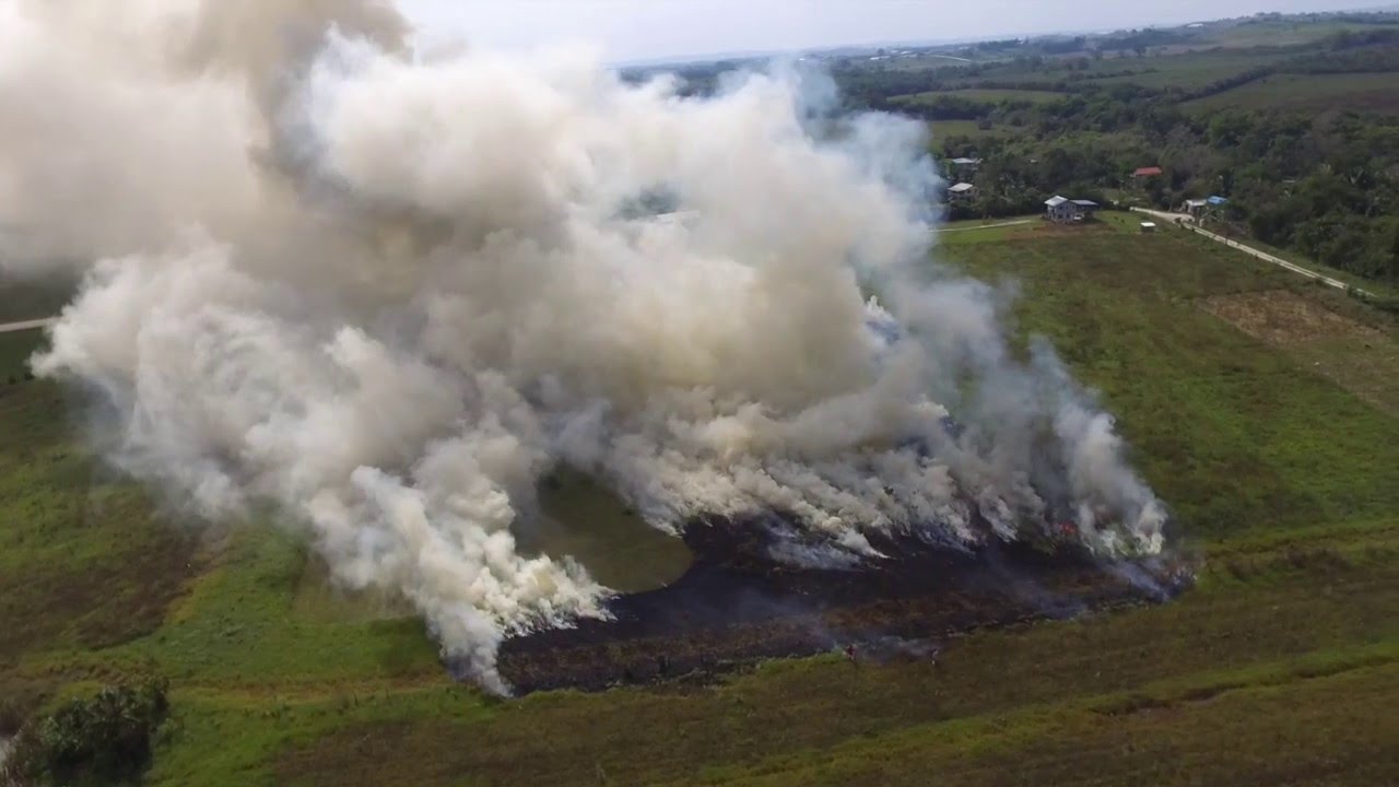 DJI Phantom flying around fire in Spanish Lookout, Belize - YouTube