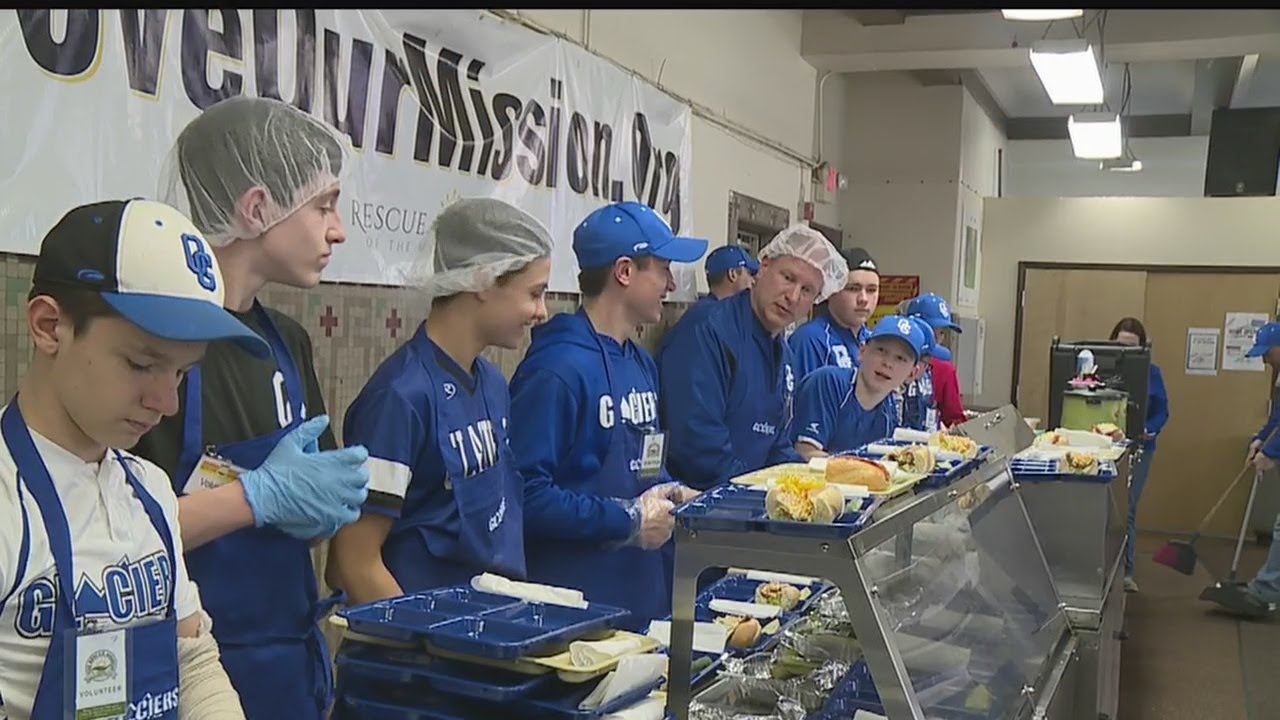 Glacier baseball team serves community at Rescue Mission - YouTube