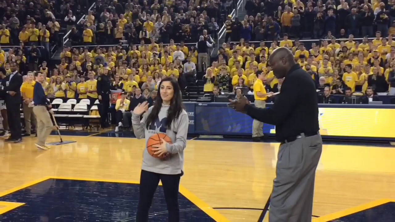 Katelynn Flaherty receives basketball from Glen Rice after becoming ...