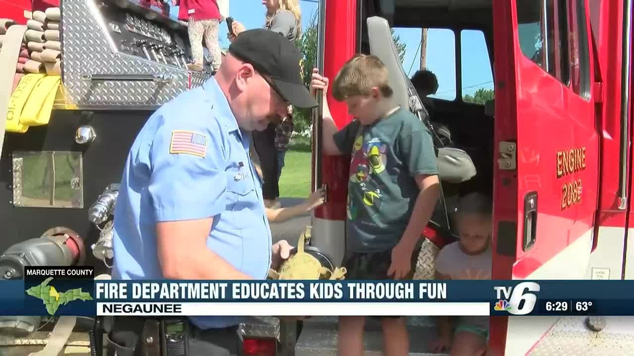 Negaunee Public Library, Fire department educate kids through fun - YouTube