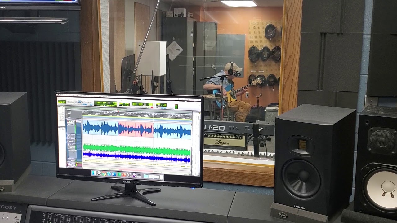 Dave Redlin record his bass line for "Victory" at UW- Oshkosh studio ...