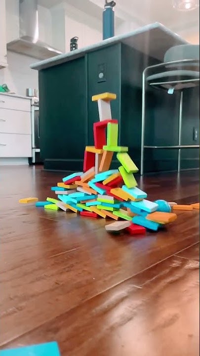 Ball Knocking Down Dominoes - YouTube