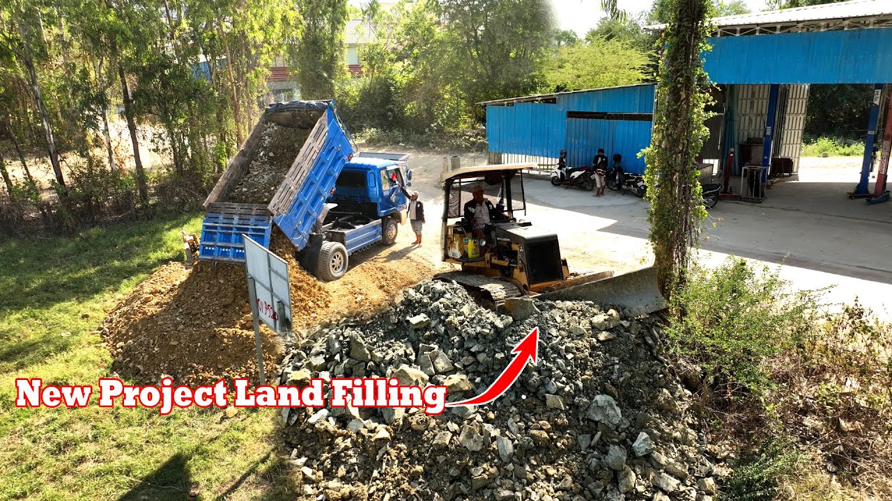 New Project Starting Up Land Filling By Mini Bulldozer Pushing Stone ...