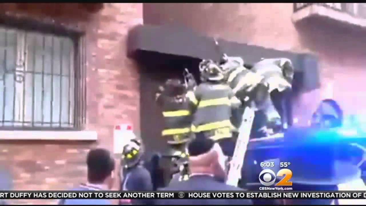 7 Year Old Boy Got Stuck Dangling In Roll Up Gate In Williamsburg - YouTube