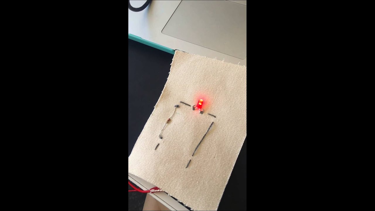Sewing with conductive thread -LED - YouTube