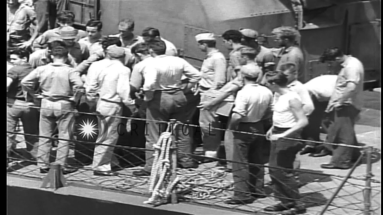 USS Trathen (DD-530) approaches and transfers captured Japanese pilot ...