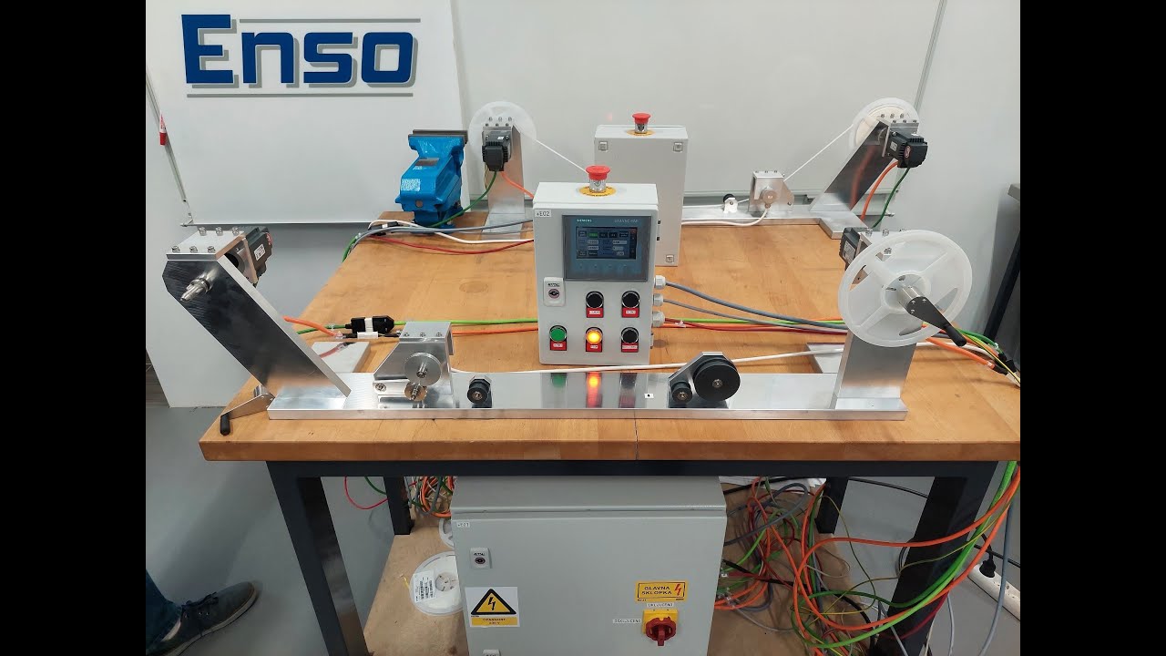 Machine for rewinding rolls with packaged electronic components in ...