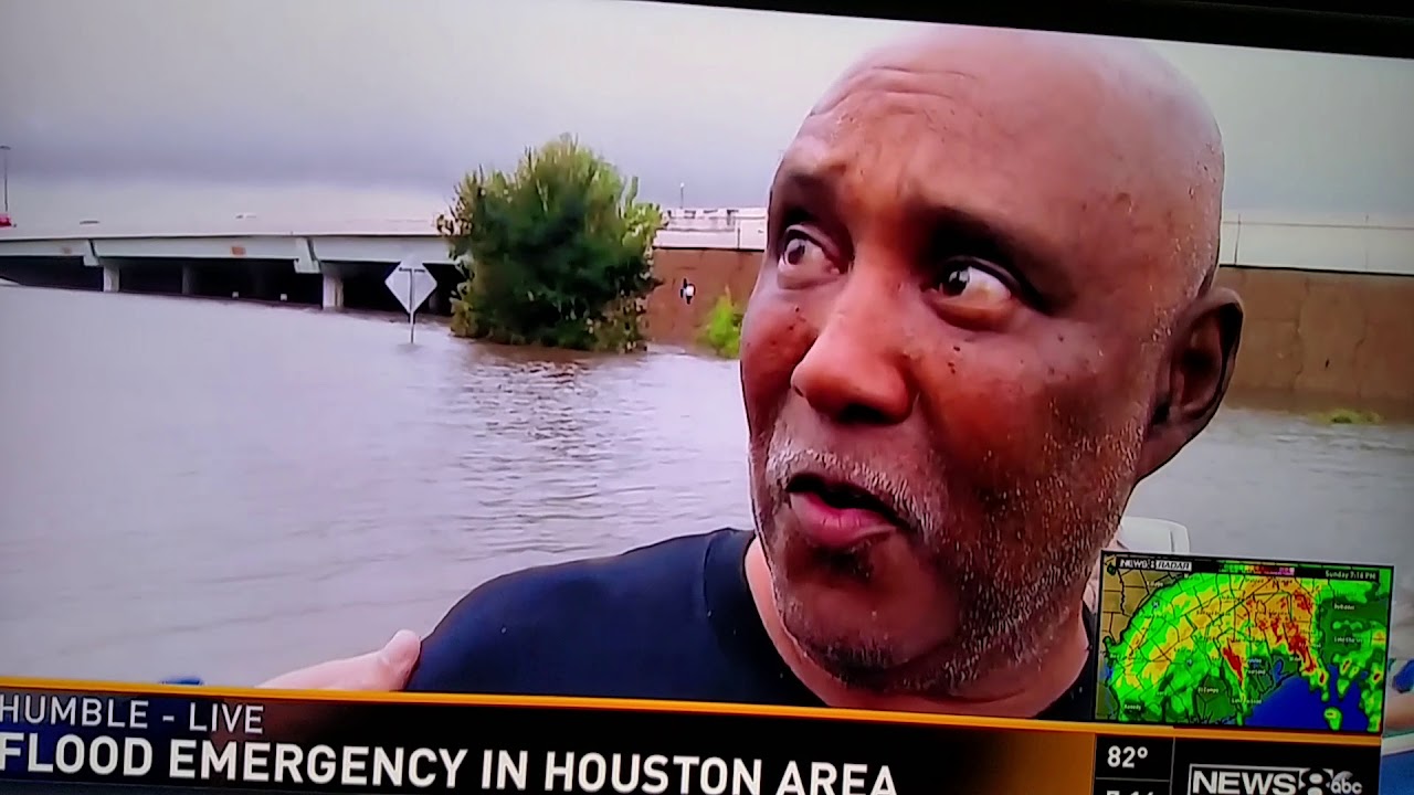 Man saved from flood water curses on live TV - YouTube