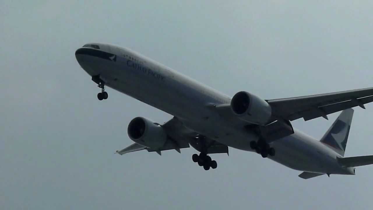 Cathay Pacific B777-300ER B-KPH Landing 25R Tan Son Nhat As CX767 - YouTube