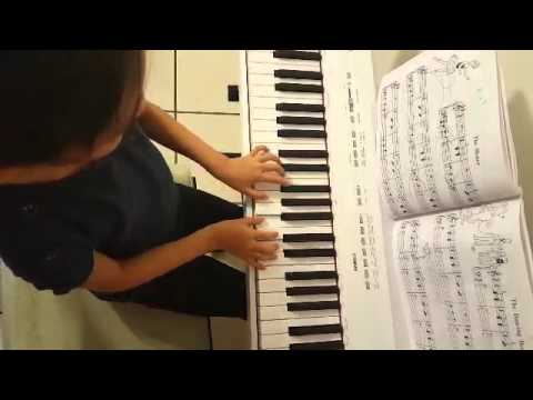 Sunny Q plays piano.