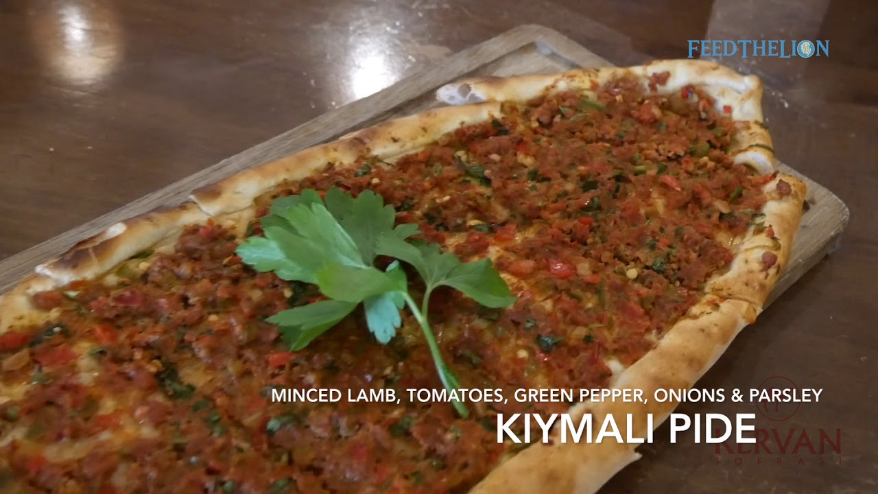 Making a Kiymali Pide (Turkish flat bread with meat and vegetables ...