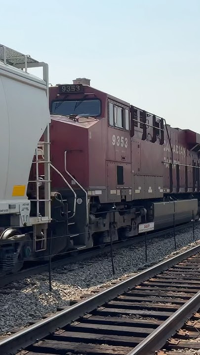 CP 9353 pushes a sand train past Mayfair - YouTube