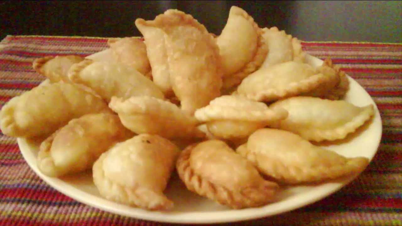 puli pitha review 2 | The traditional food of bengali - YouTube