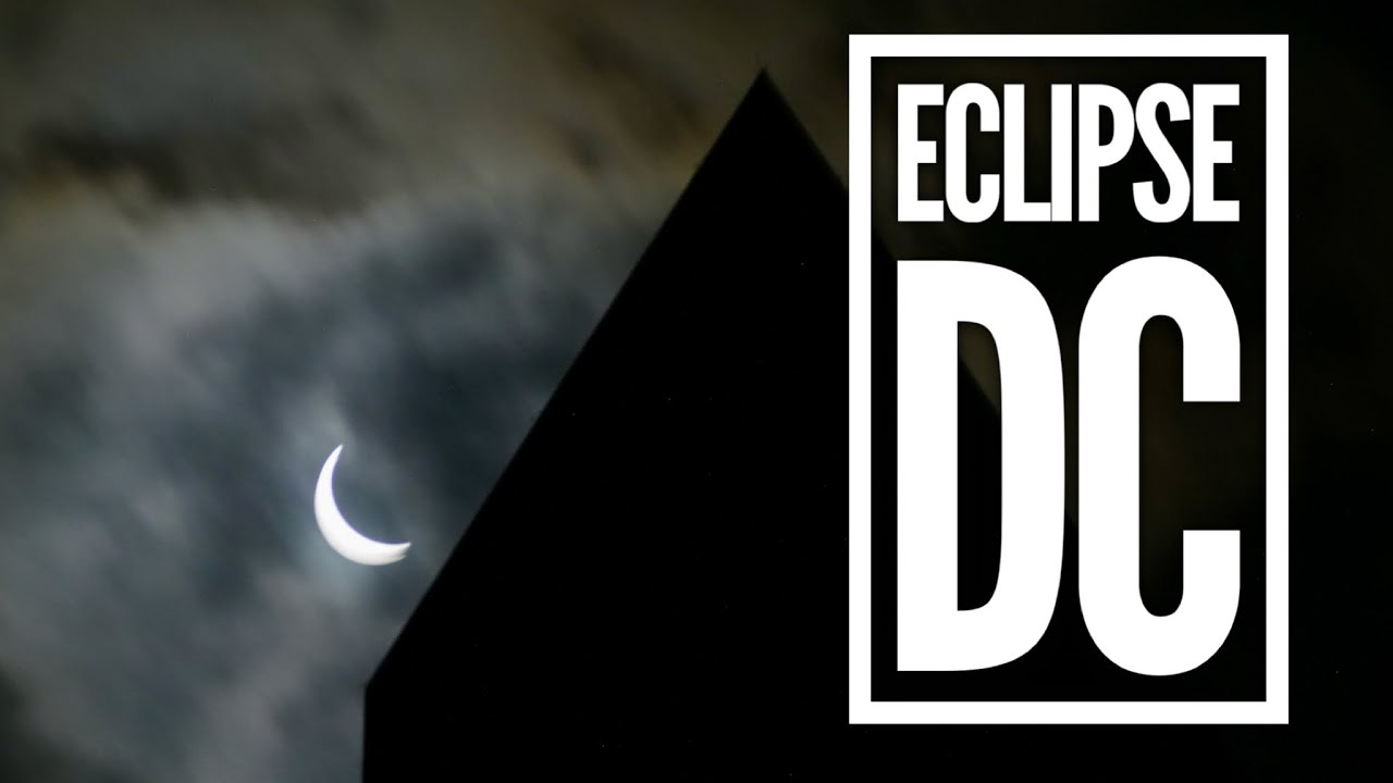 Eclipse Day in Washington D.C., and a police barricade in Glover Park ...