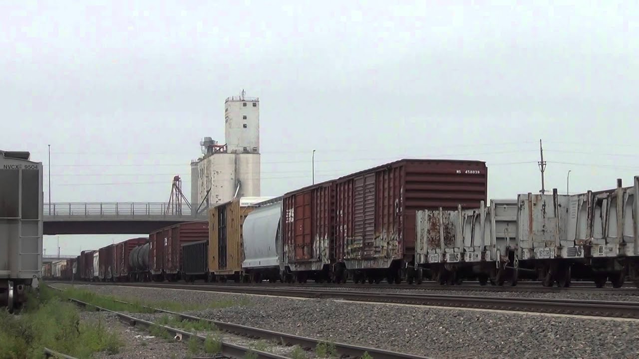 Union Pacific C44/60AC #7355 manifest train departs North Platte NE ...