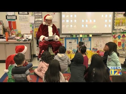 Santa visits local elementary school he attended 90 years later - YouTube