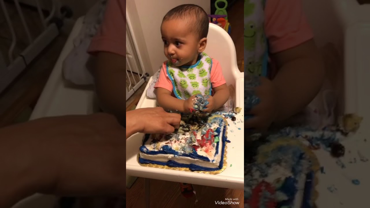 Funny baby mess with cake on his first birthday - YouTube