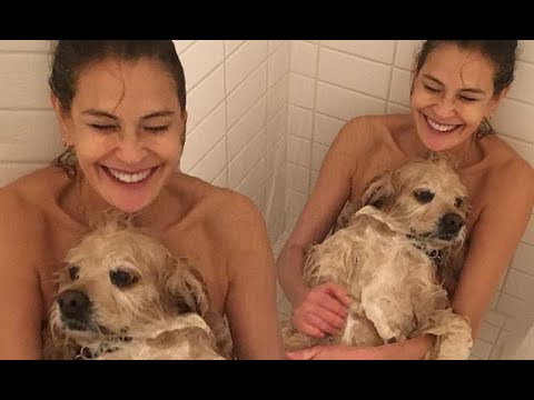 Desperate Housewives star Teri Hatcher, 56, shares naked snap of herself showering with her dog