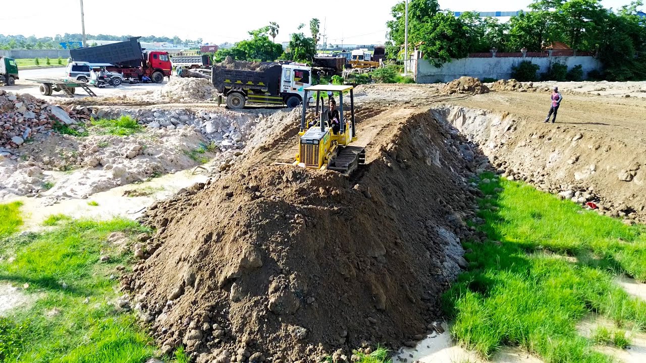 New Small Project Land Filling Up With Mini Bulldozer And Dump Truck ...