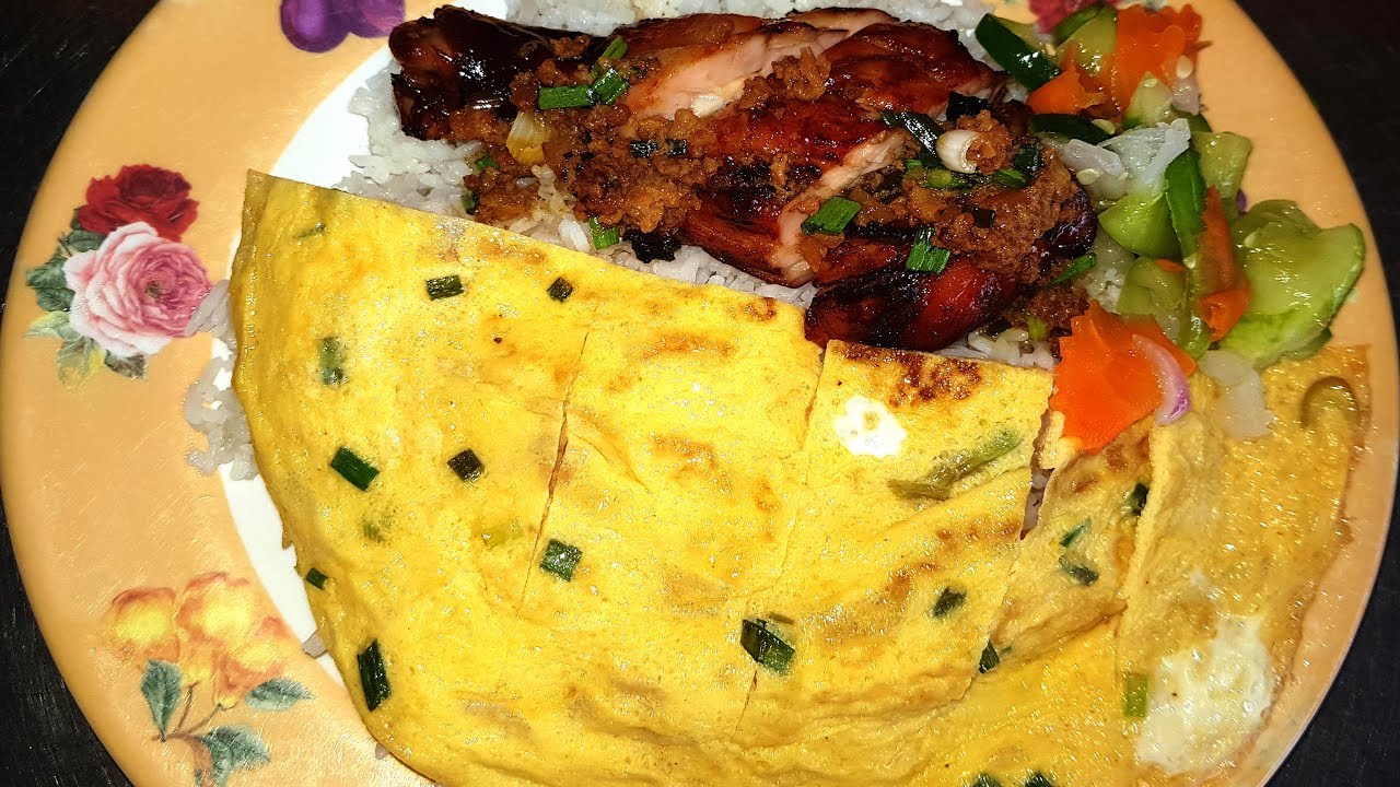 Cambodian Breakfast - Eating Rice Topped With Pork And Chicken And ...