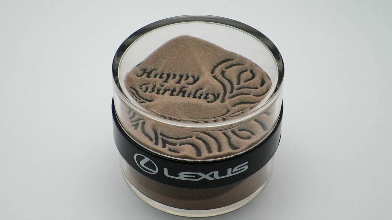 cylinder sand paperweight promotional gift - YouTube