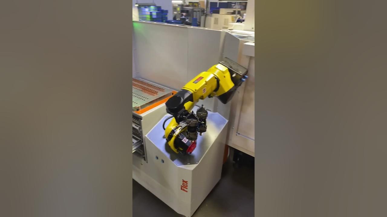 Agile Flex loading a FANUC ROBODRILL - YouTube