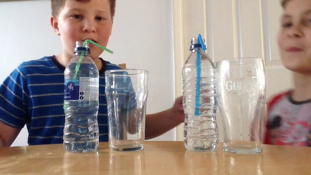 How to transfer water into a glass with out moving the bottle - YouTube