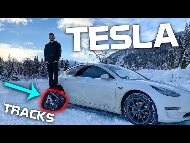 Tank Tracks Turn the Tesla Model 3 Into a Surprisingly Capable Off-Roader